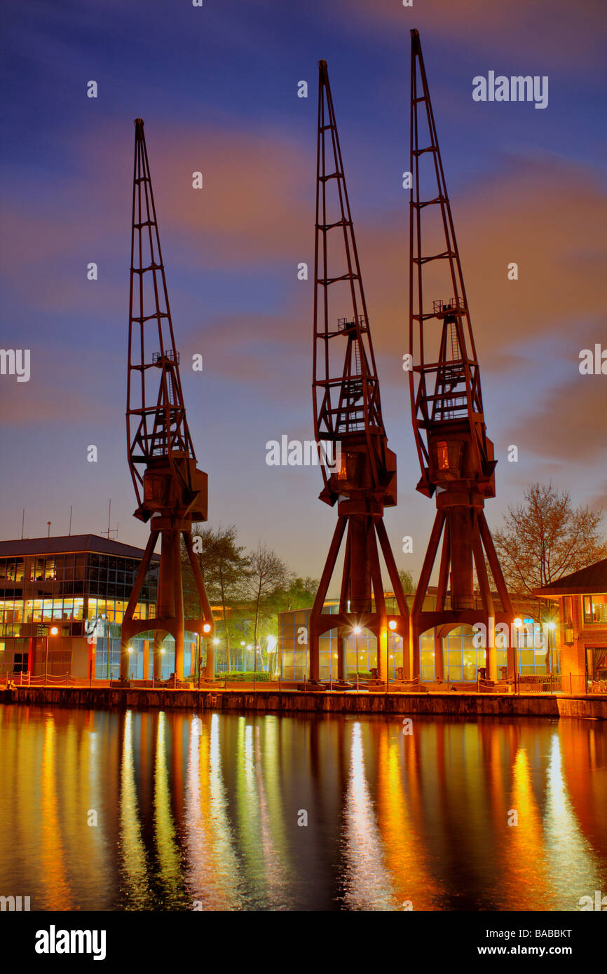 Old Shipping cranes at Millwall Docks shot at night Stock Photo - Alamy