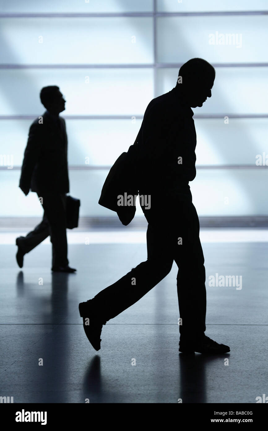Silhouettes of two men Stock Photo - Alamy