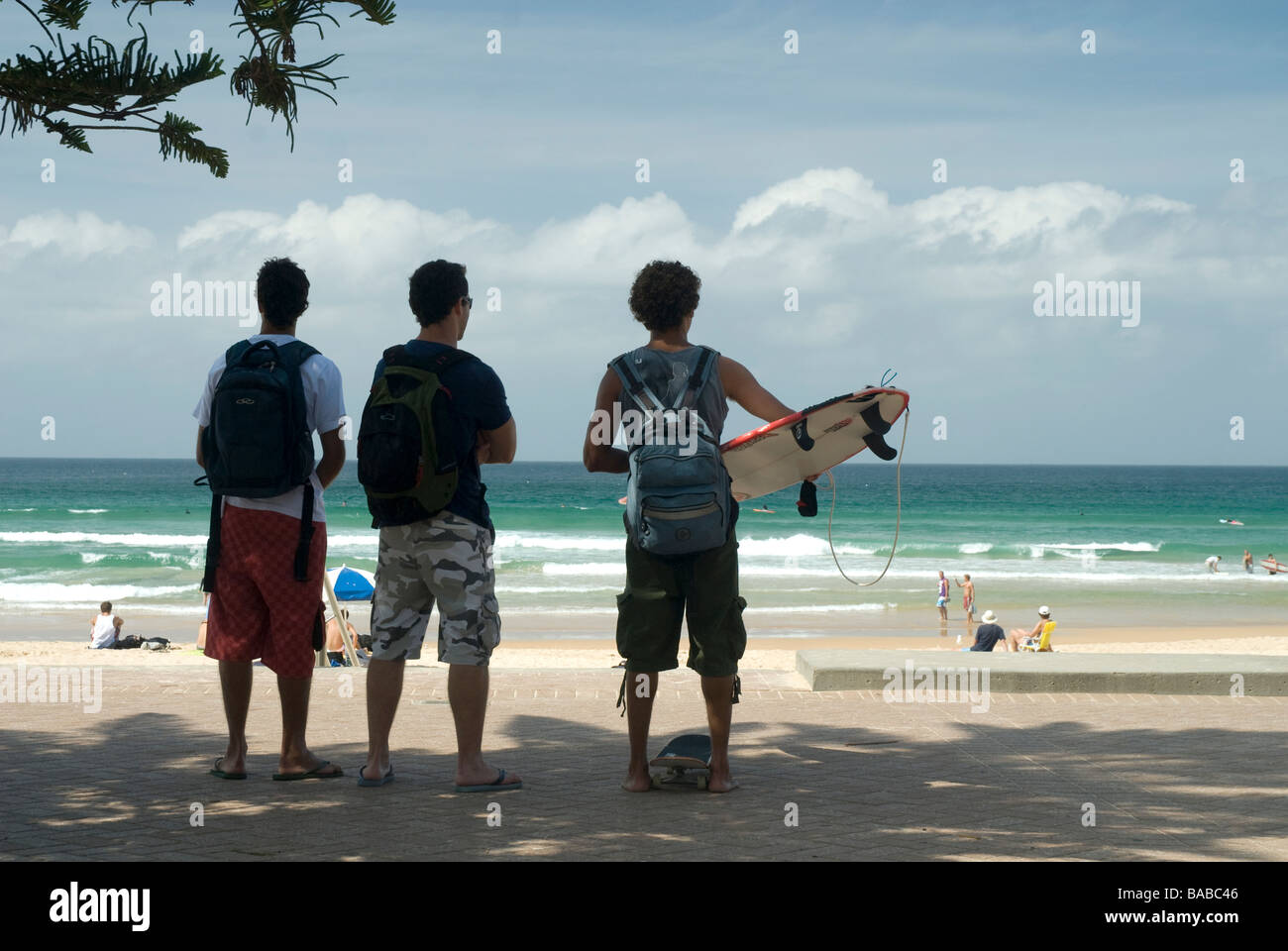Surfers surveying the waves, Manly Beach, New South Wales, Australia ...