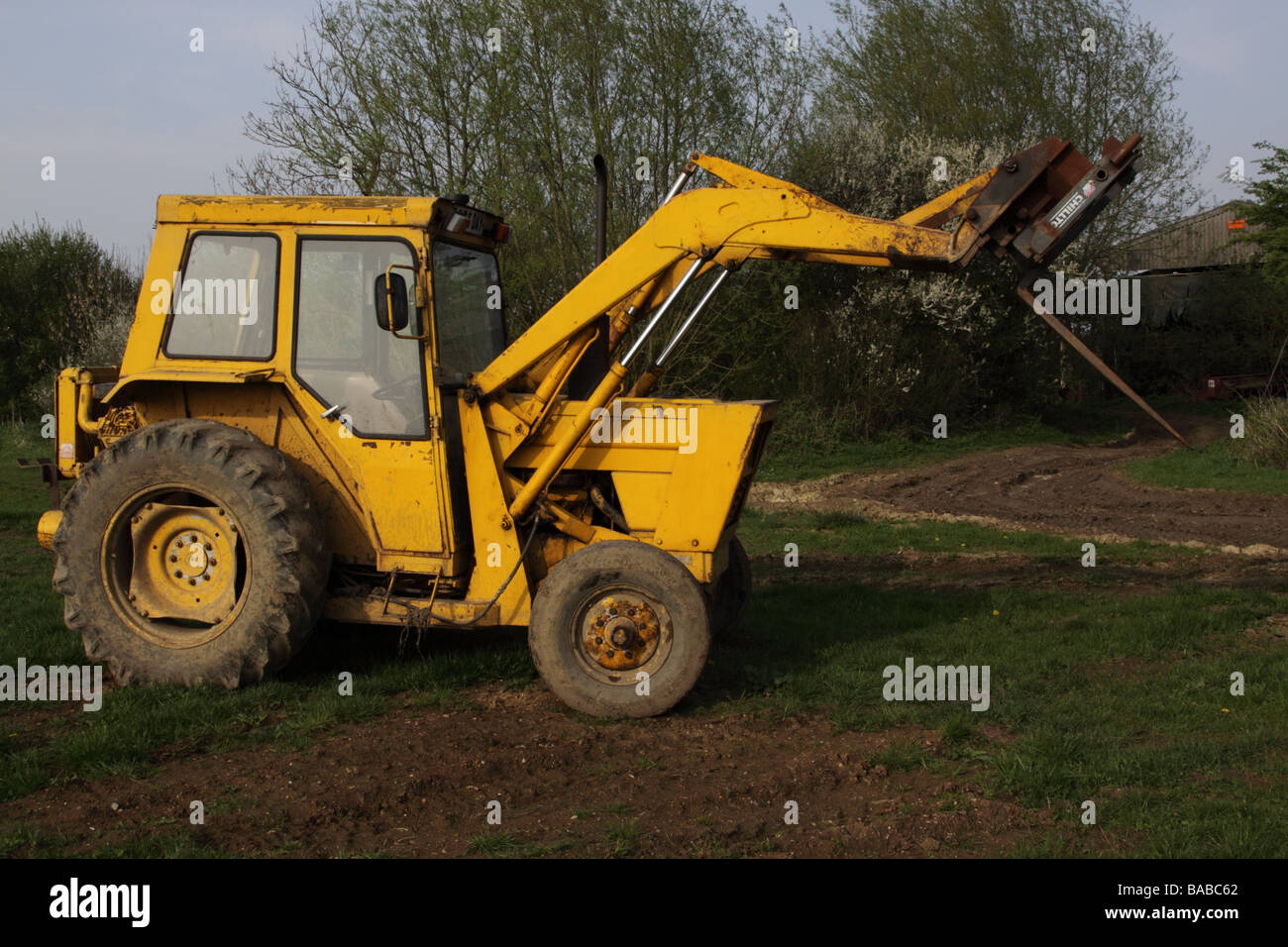 Tractor in English countryside Stock Photo - Alamy