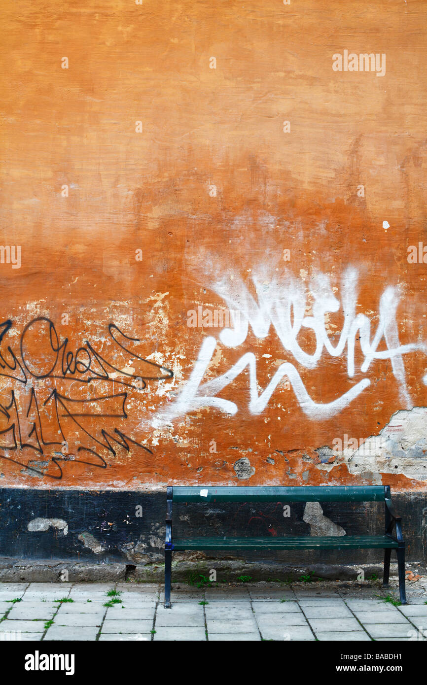 Graffiti on a wall and a bench Sweden Stock Photo - Alamy