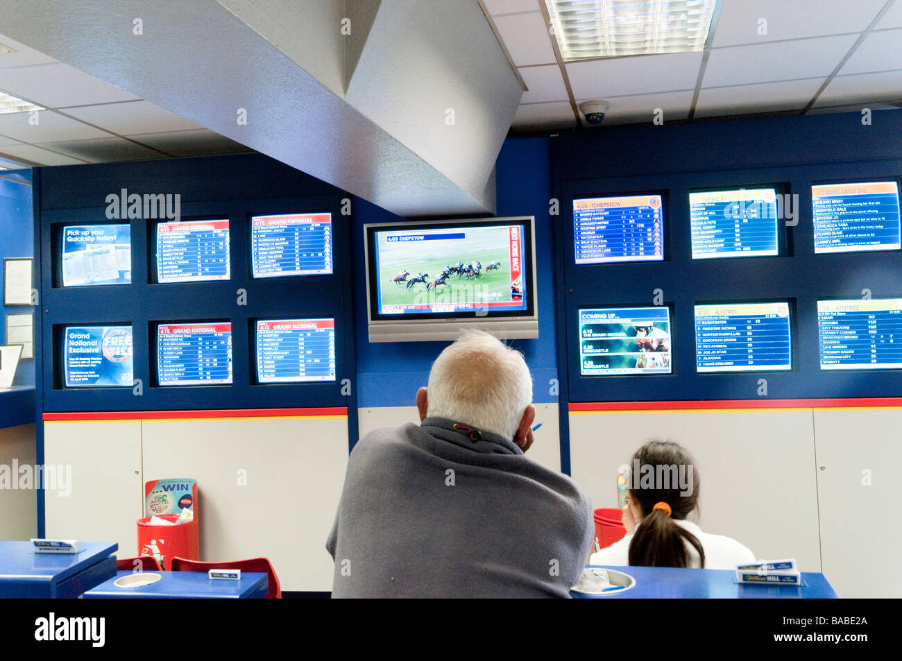 Screens in William Hill betting shop London England UK Stock Photo - Alamy