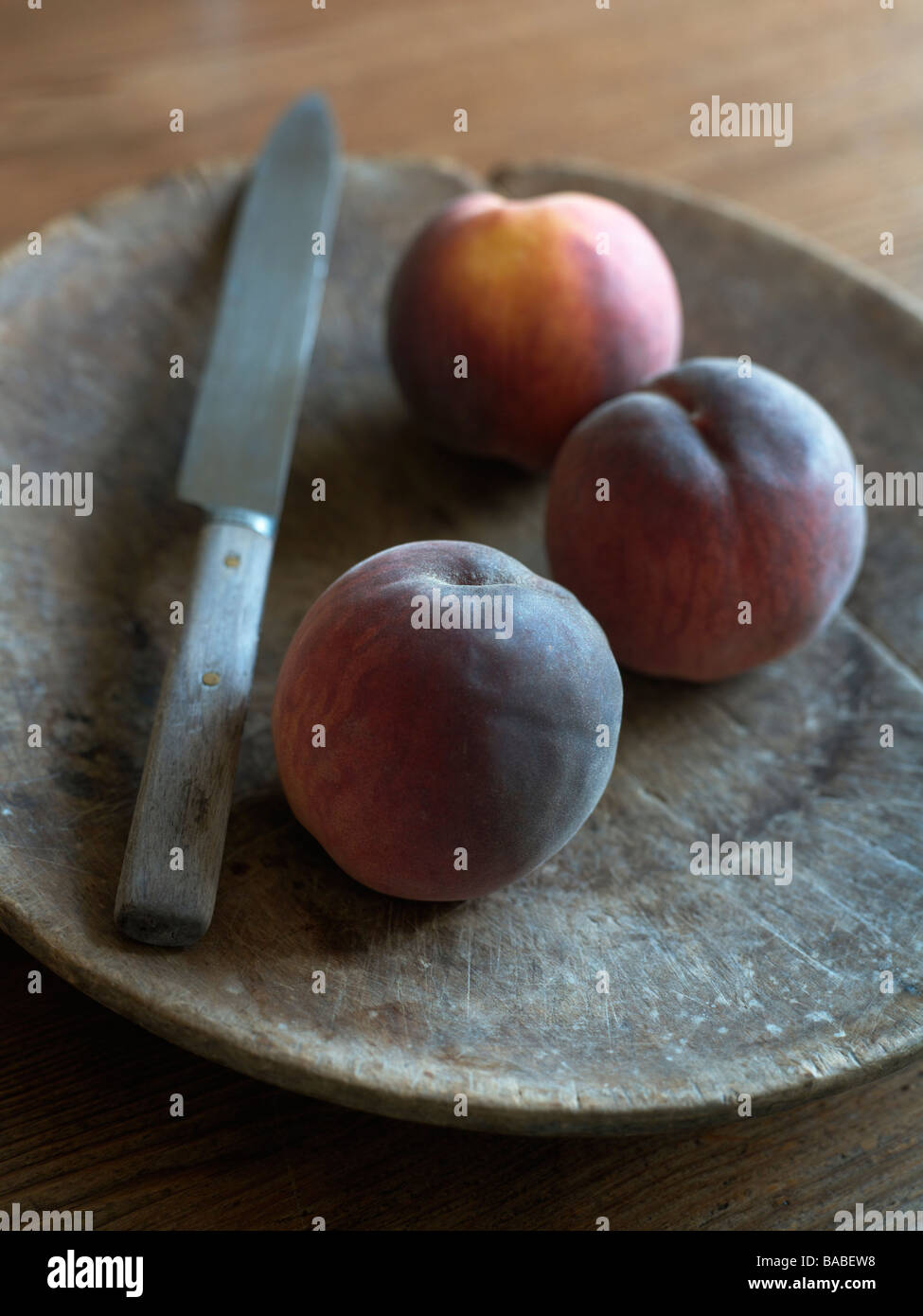 Three peaches Sweden Stock Photo - Alamy