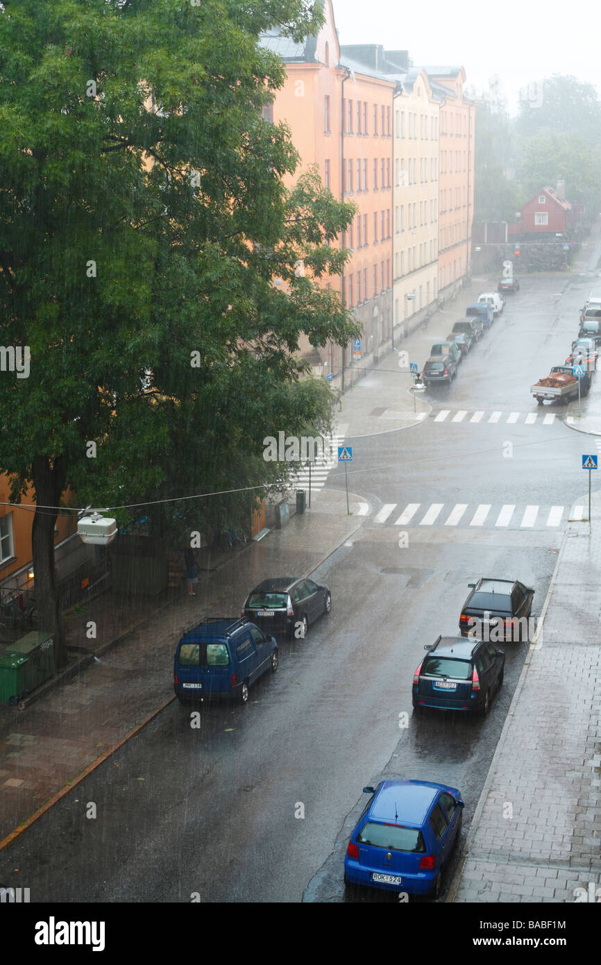 Shower of rain Asogatan Stockholm Sweden Stock Photo - Alamy