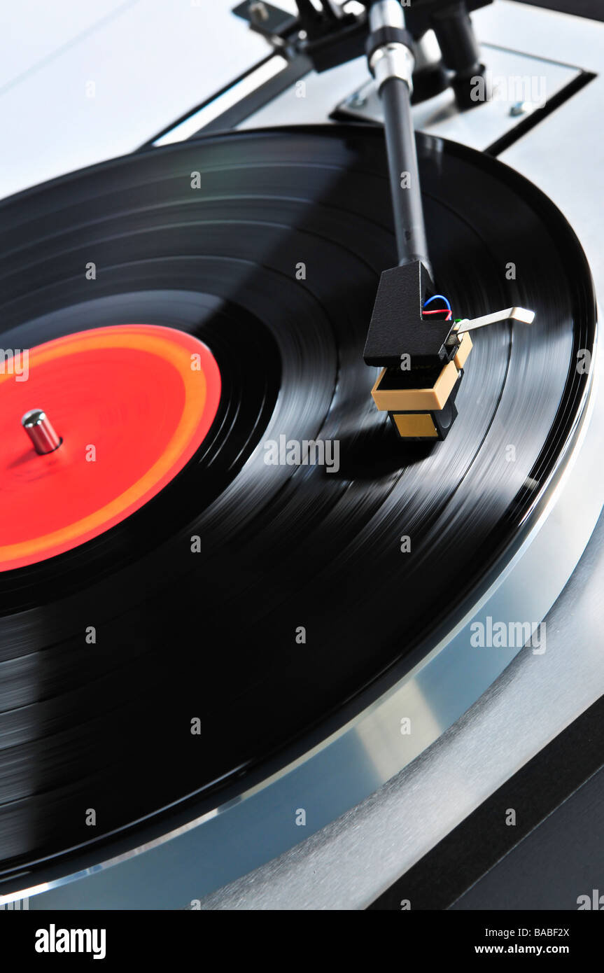 Vinyl record spinning on turntable close up Stock Photo - Alamy