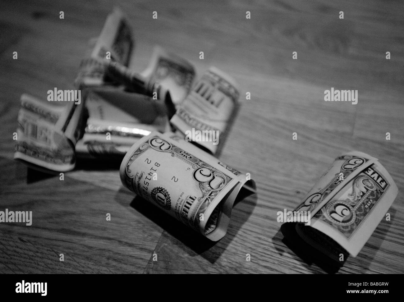 Dollar bills on white Black and White Stock Photos & Images - Alamy