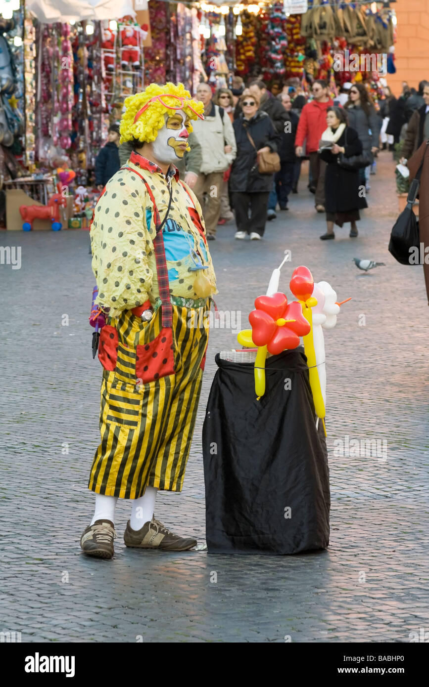 A clown in Piazza Navona during Christmas time, Rome, Italy Stock Photo ...