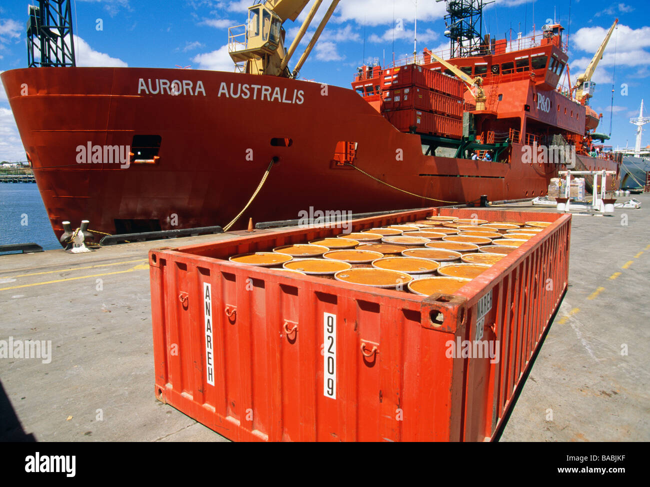 Ship with containers at harbour Stock Photo - Alamy