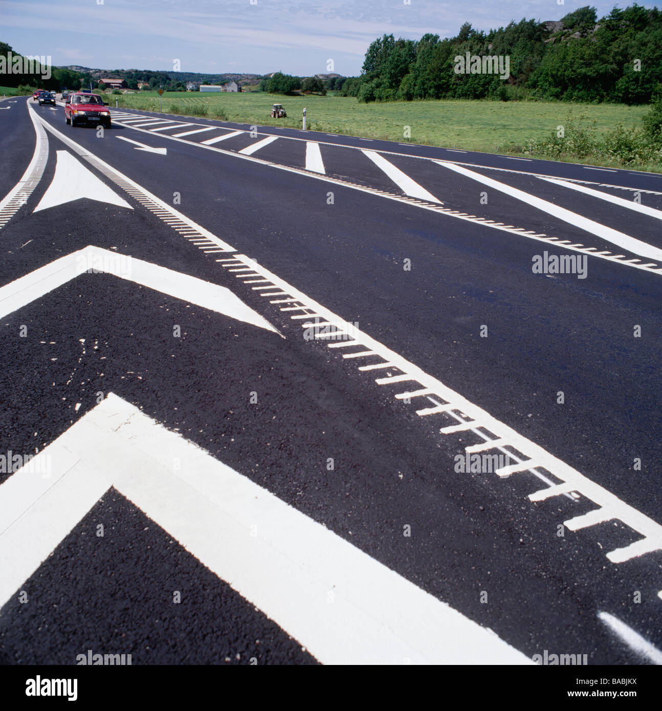 White markings on road hi-res stock photography and images - Alamy