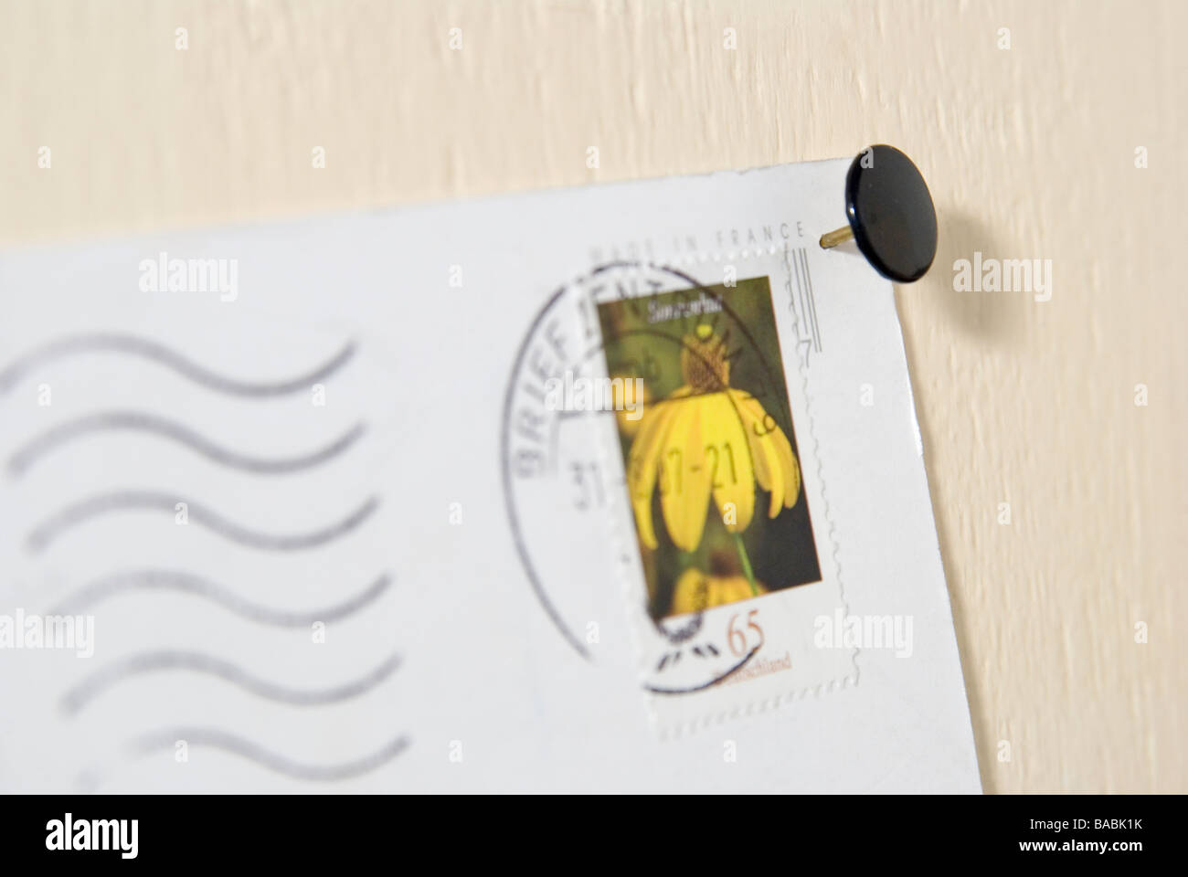 postcard attached with pin Stock Photo - Alamy