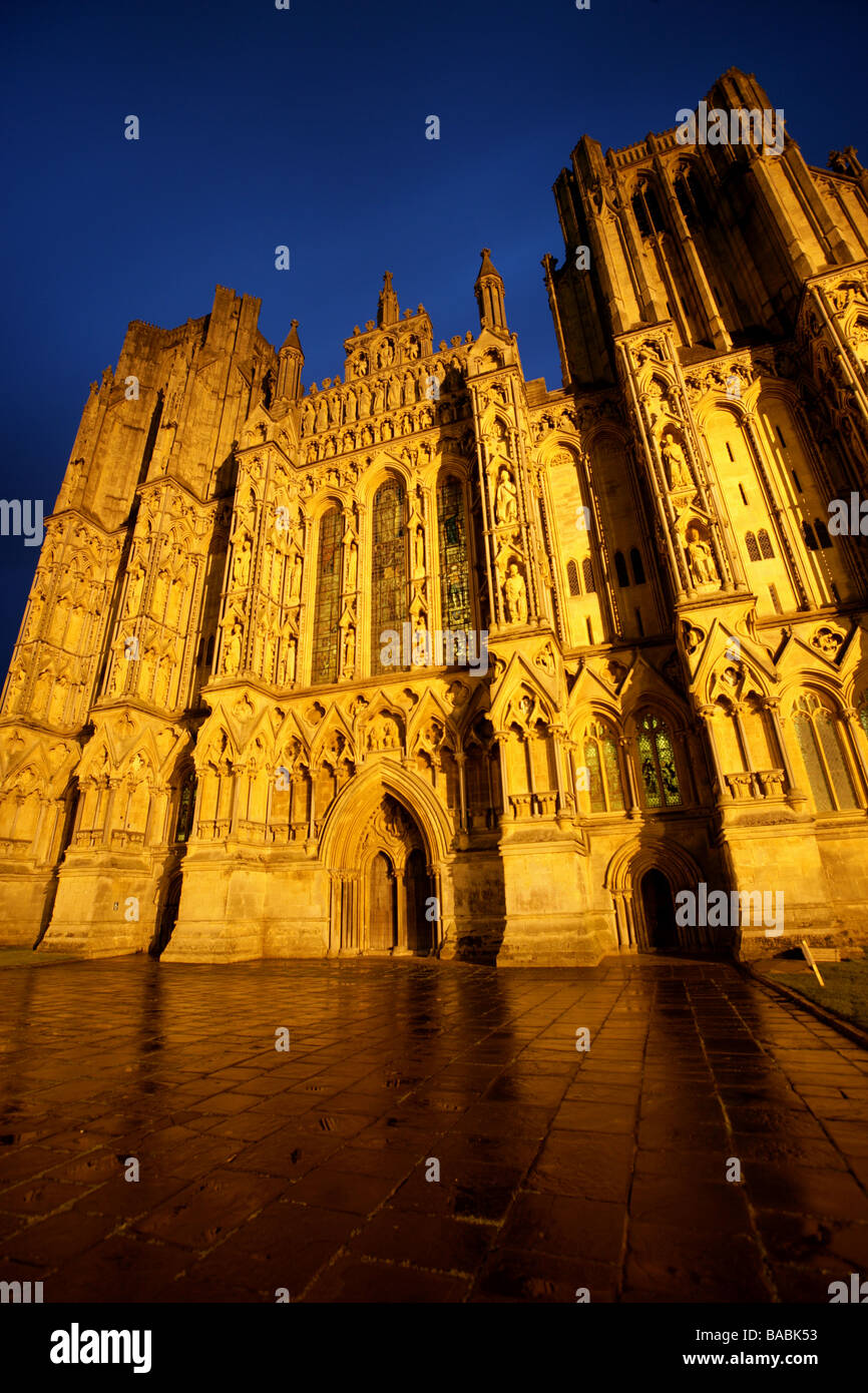 City of Wells, England. Low angled rainy night view of the West Front ...