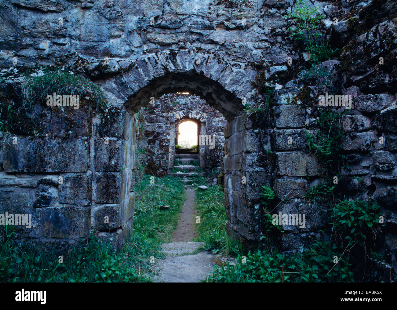 Pathway amidst stone structure hi-res stock photography and images - Alamy