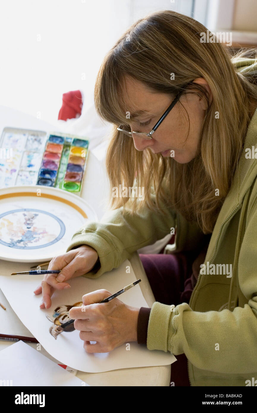 female Artist at work in her studio Stock Photo - Alamy