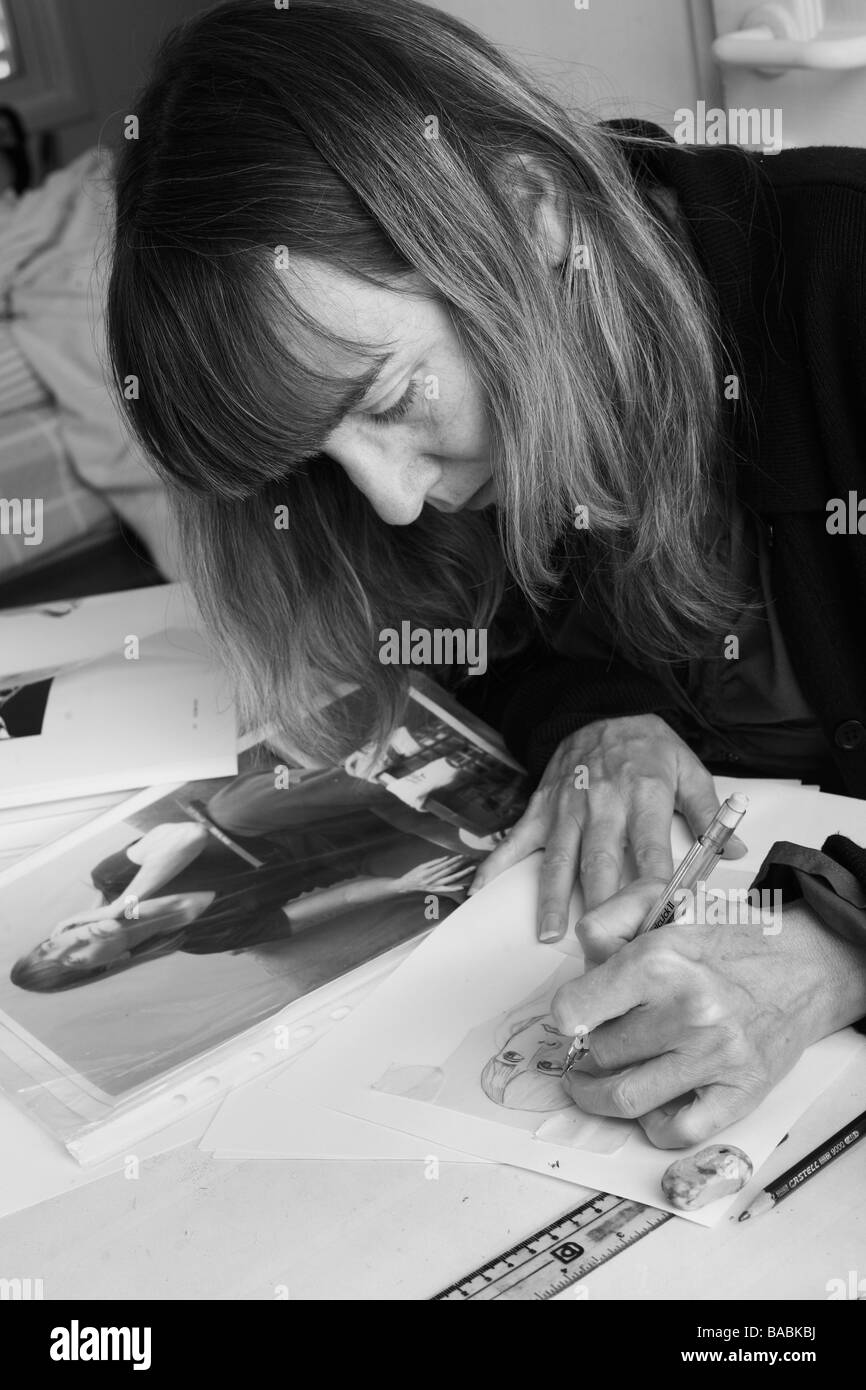 female Artist at work in her studio Stock Photo - Alamy