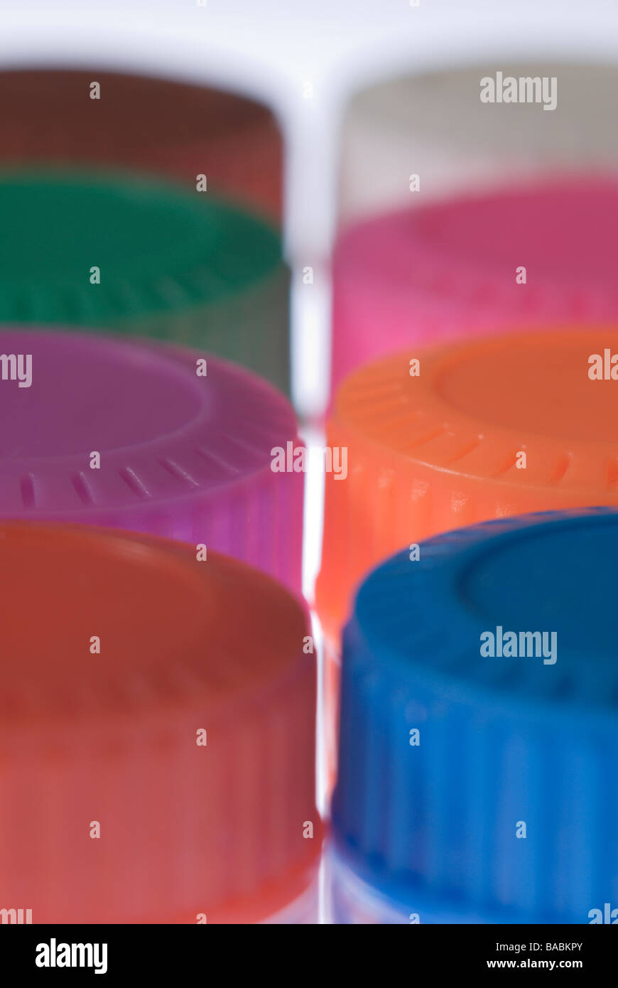 Tops of coloured paint pots Stock Photo - Alamy