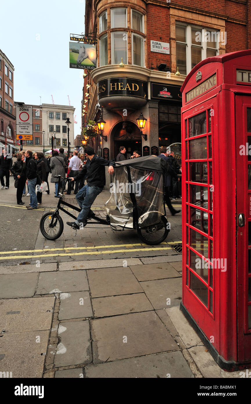 Cycle cabs in London Street Stock Photo - Alamy