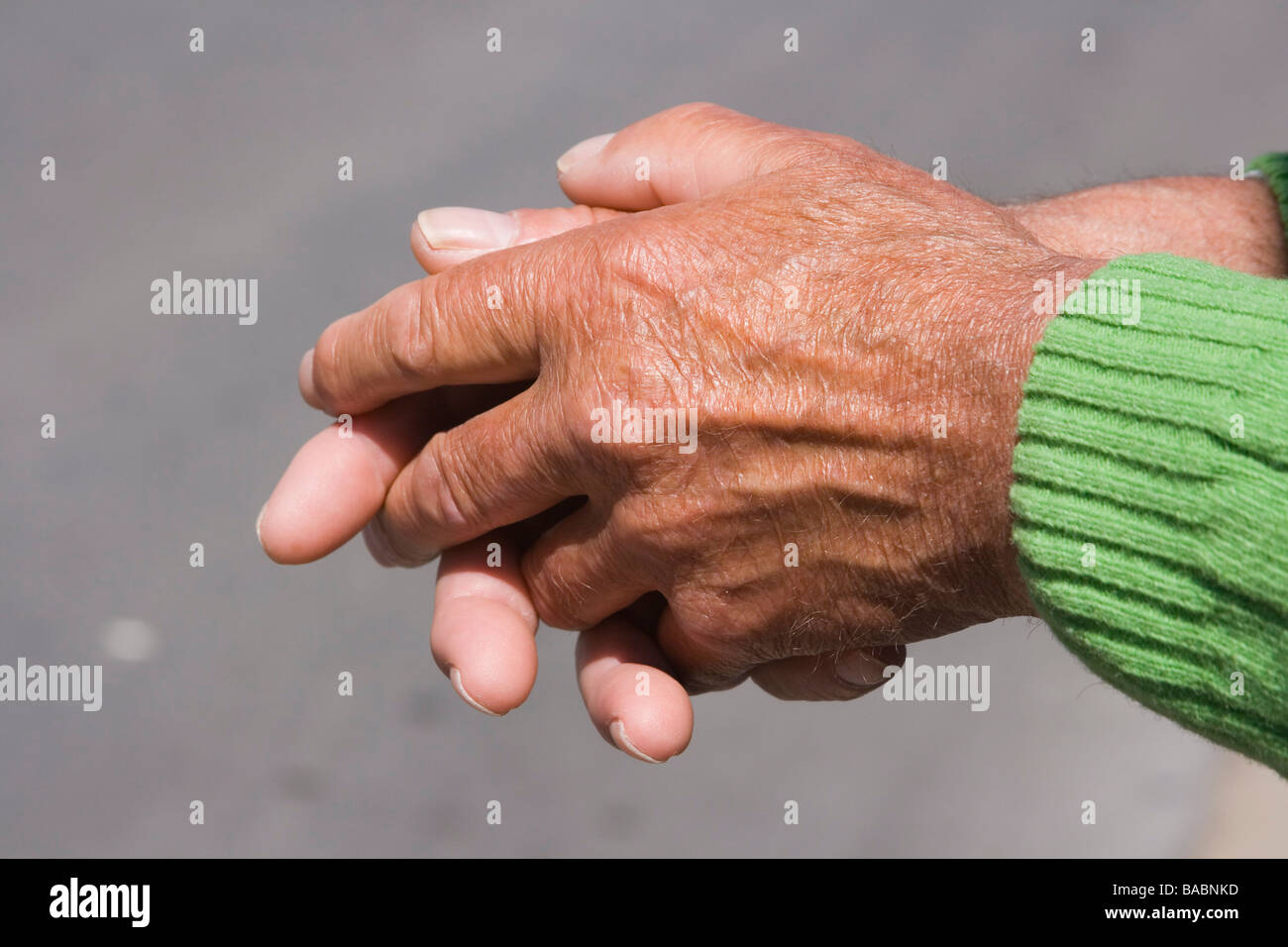 Old clasped hands hi-res stock photography and images - Alamy