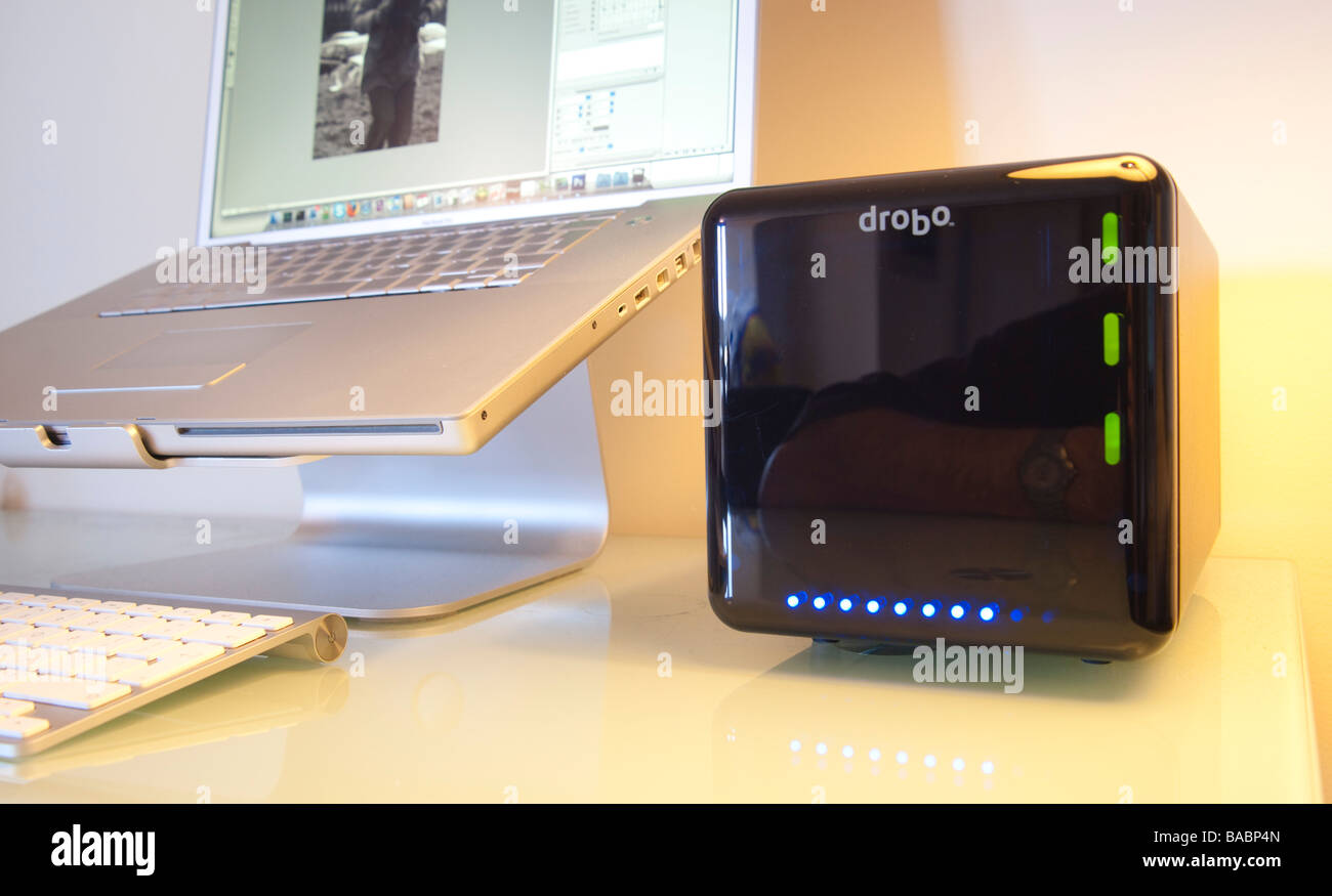 2009 Drobo brand RAID hard disc unit seen with Apple Macbook laptop ...