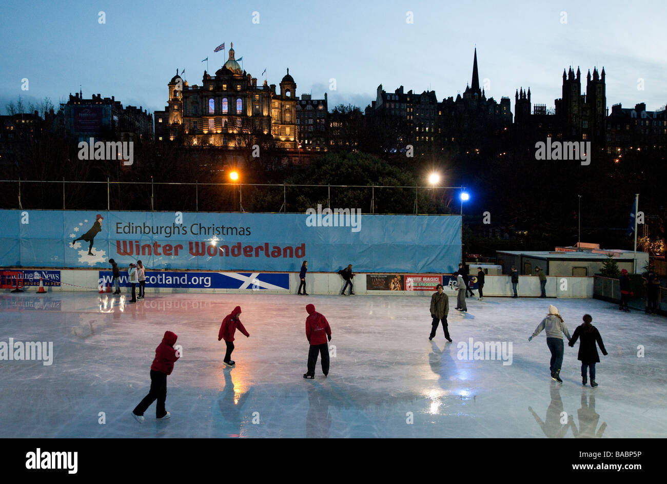 Edinburgh December city at night the open air ice rink Stock Photo - Alamy