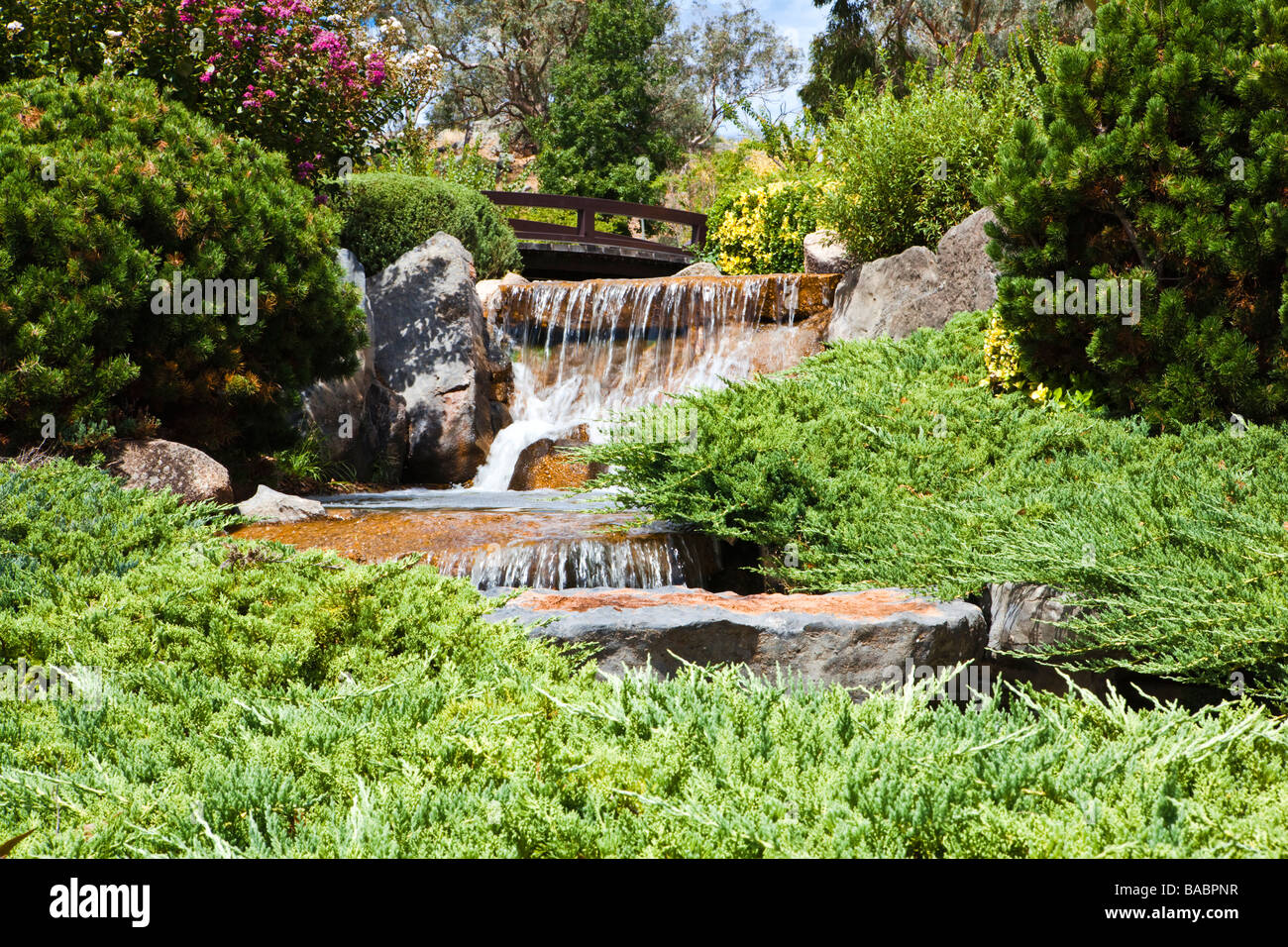 A waterfall in a garden Stock Photo - Alamy
