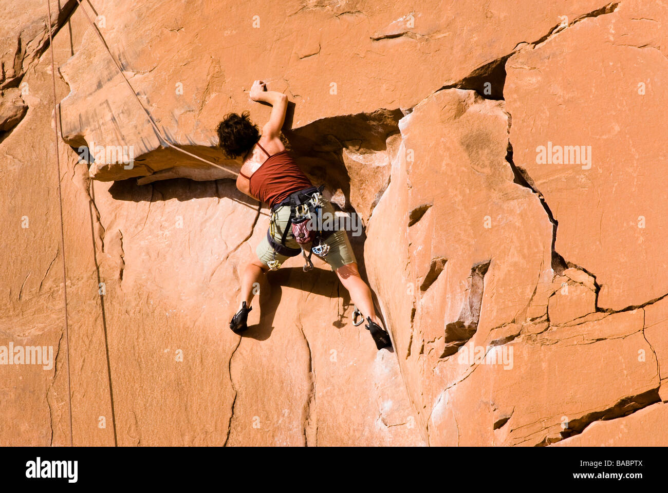 Female rock climber ascending sandstone hi-res stock photography and ...