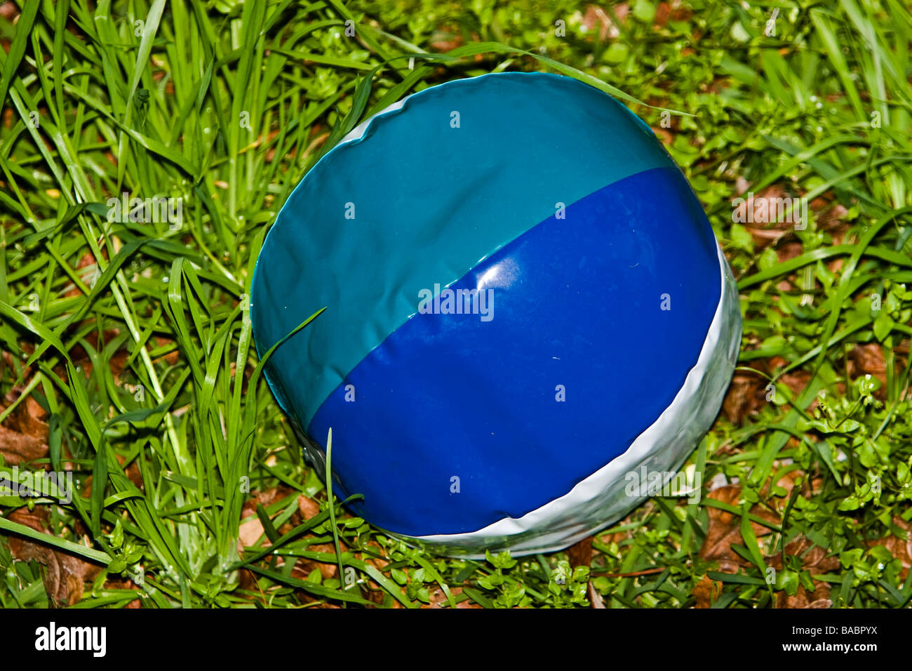 An inflatable ball on grass Stock Photo - Alamy