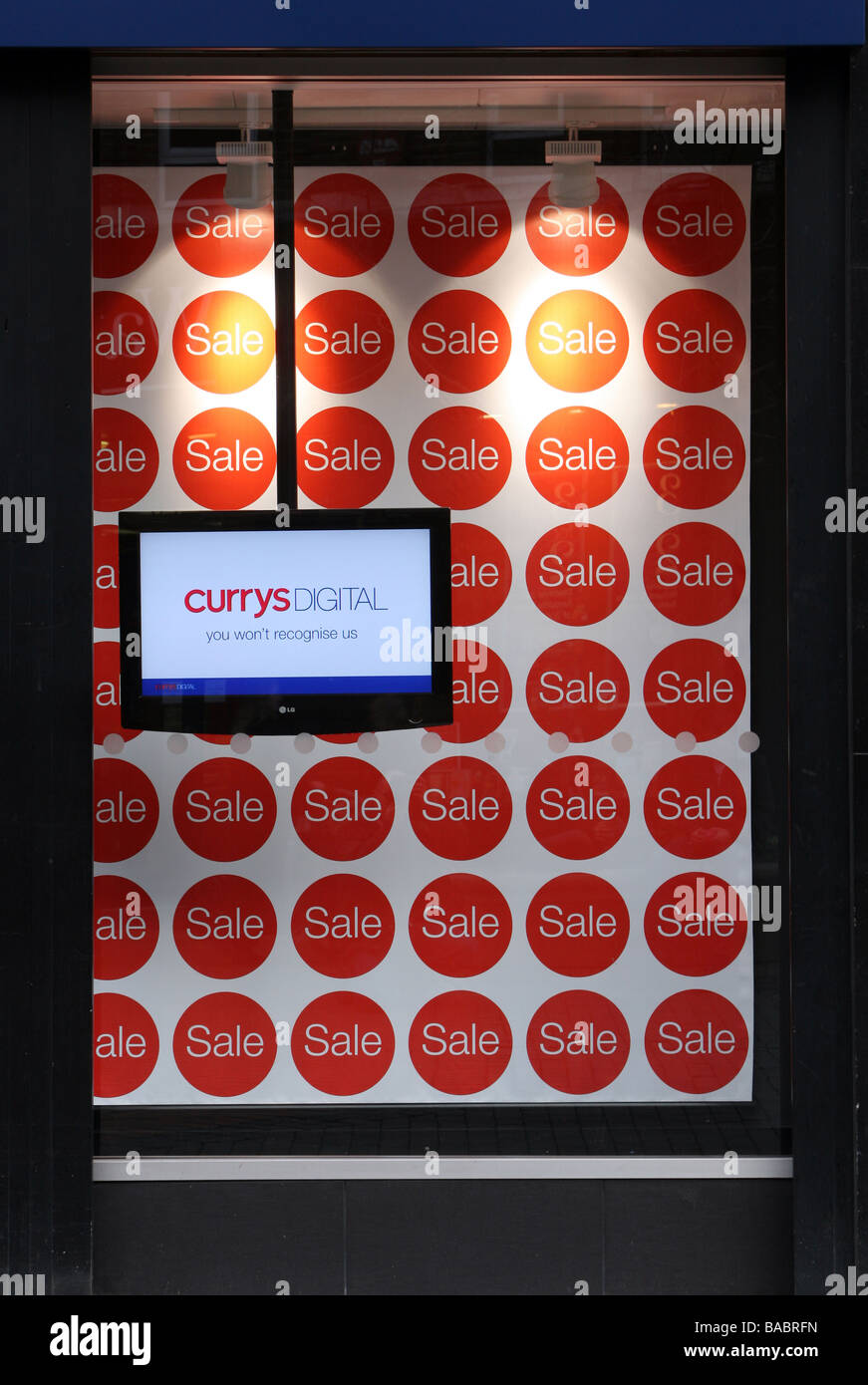 Sale signs in the window of a Currys Digital store Stock Photo - Alamy