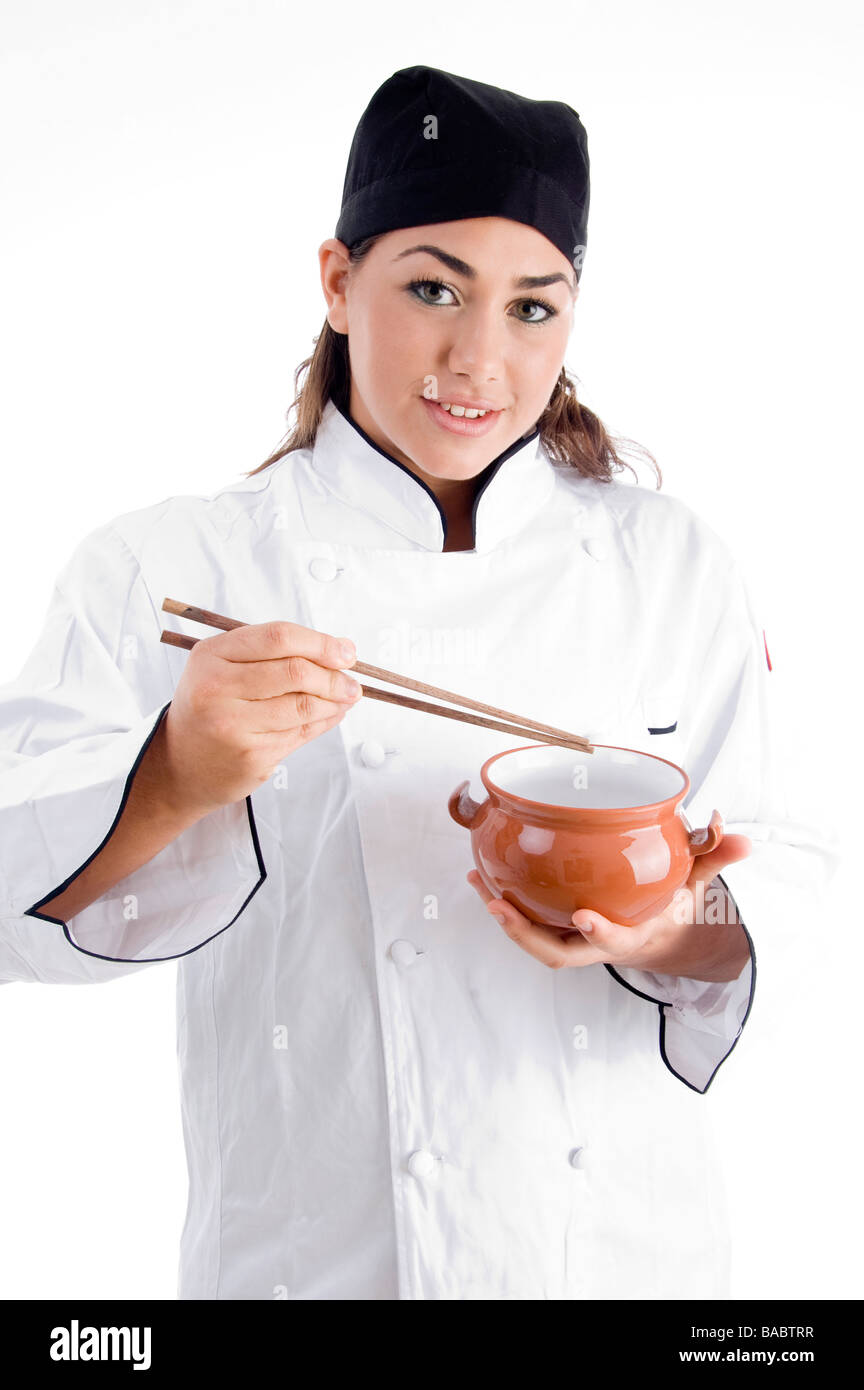 beautiful female chef posing with chopstick and bowl Stock Photo - Alamy