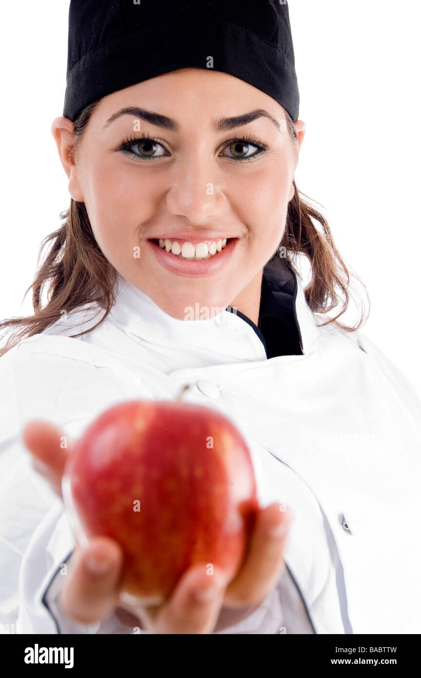 professional female chef showing fresh apple Stock Photo - Alamy