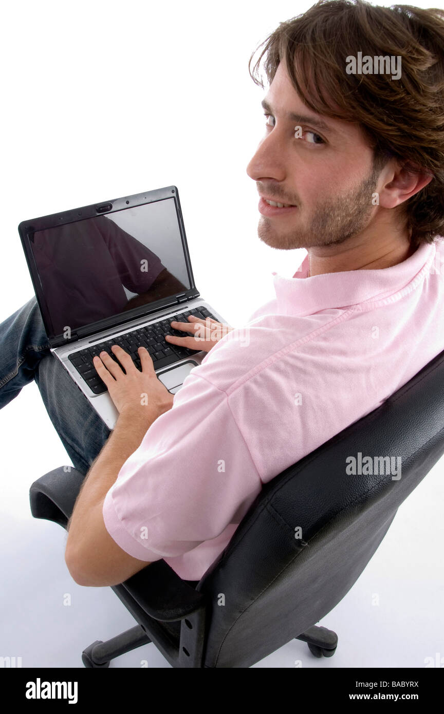 side view of man with laptop Stock Photo - Alamy