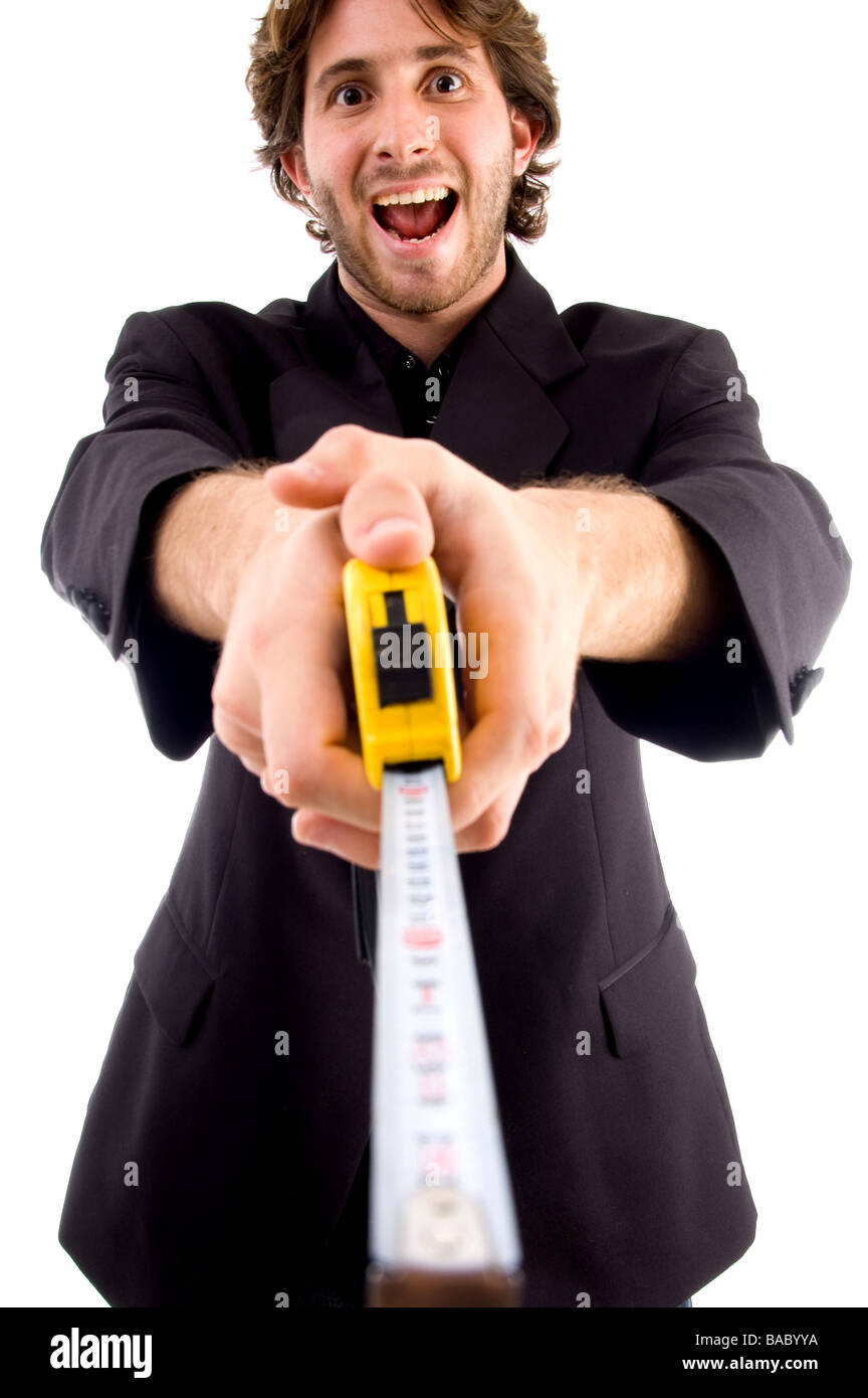 pleased man showing measuring tape Stock Photo - Alamy