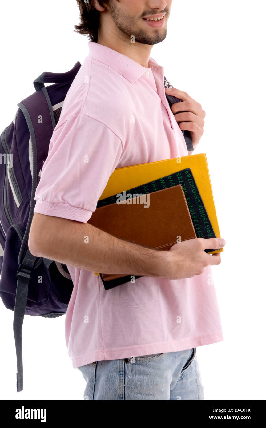 young man holding bag and books Stock Photo - Alamy