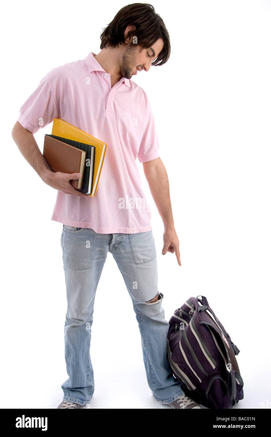 standing student pointing to bag Stock Photo - Alamy