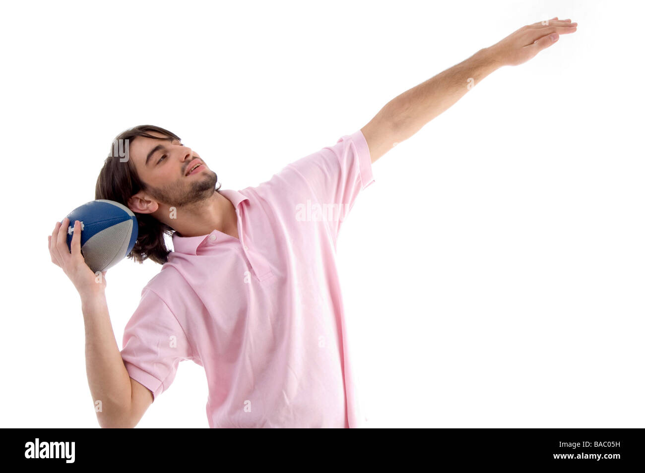 young man with rugby ball Stock Photo - Alamy