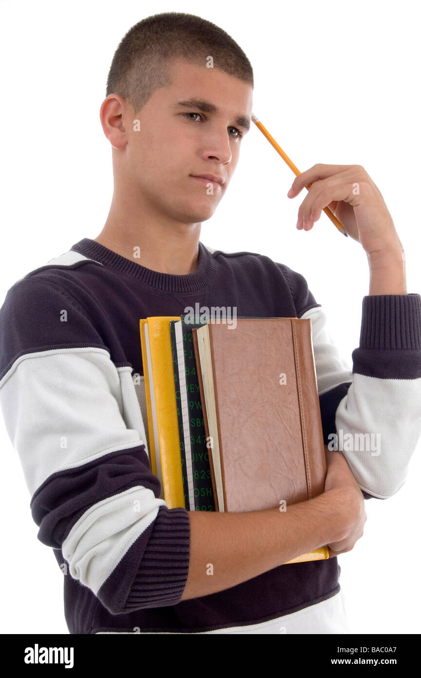 thinking student holding books Stock Photo - Alamy