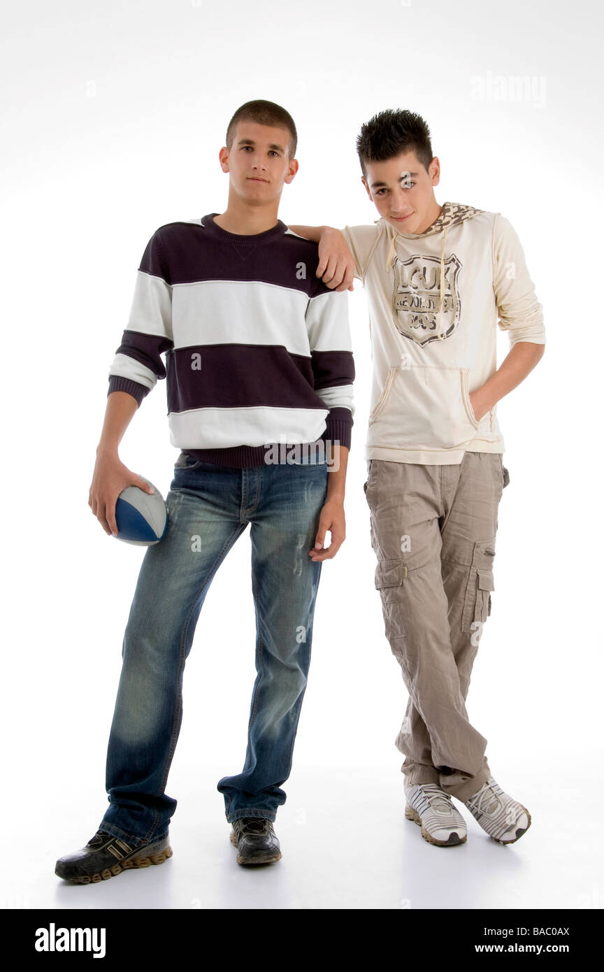 standing friends with rugby ball Stock Photo - Alamy