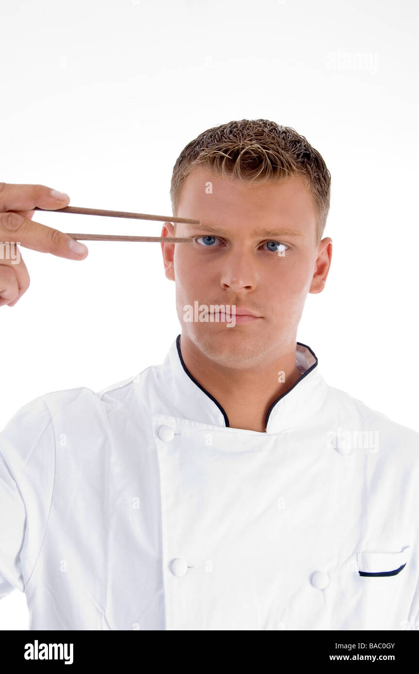 chef looking chopsticks Stock Photo - Alamy