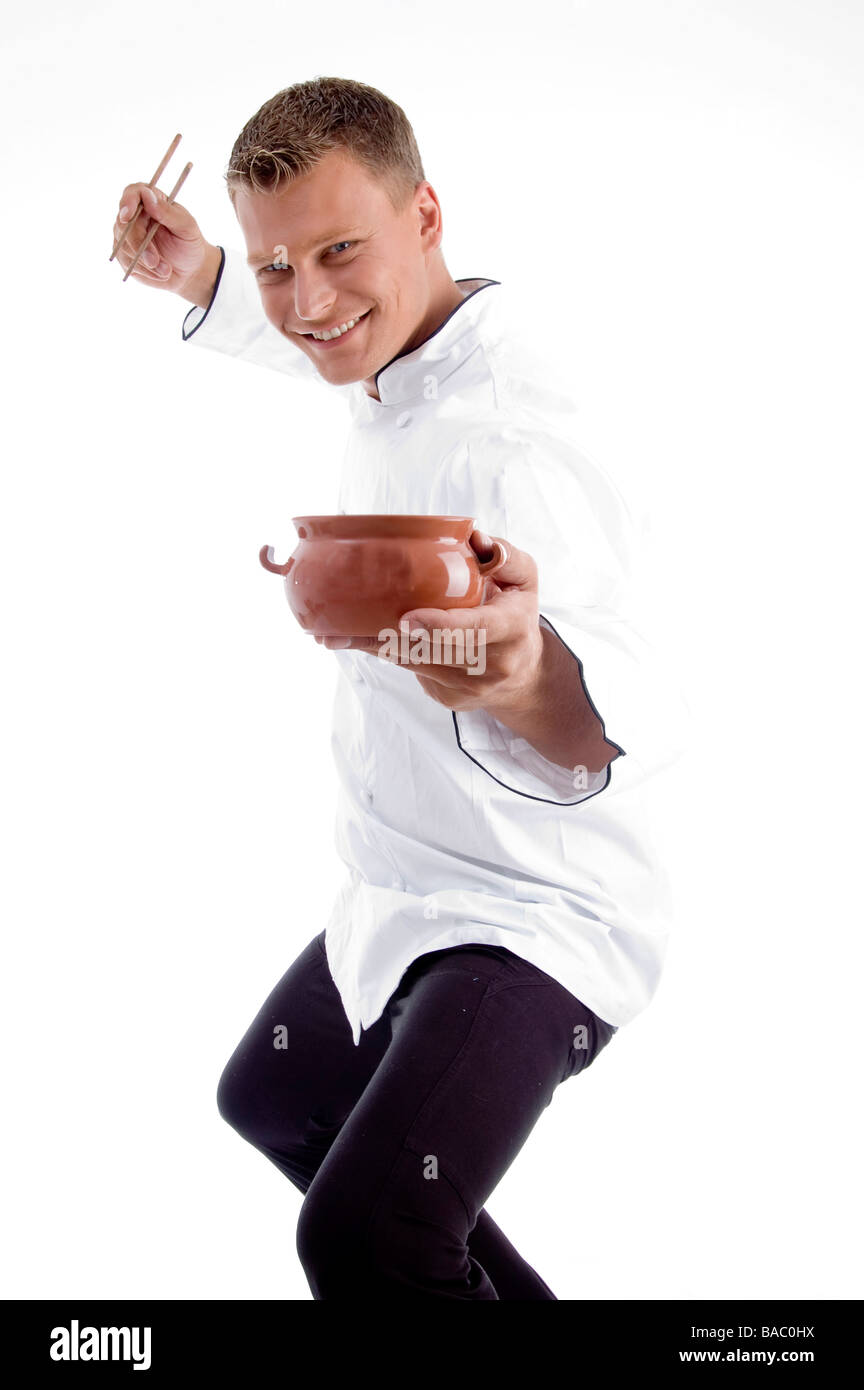 handsome chef posing with utensils Stock Photo - Alamy