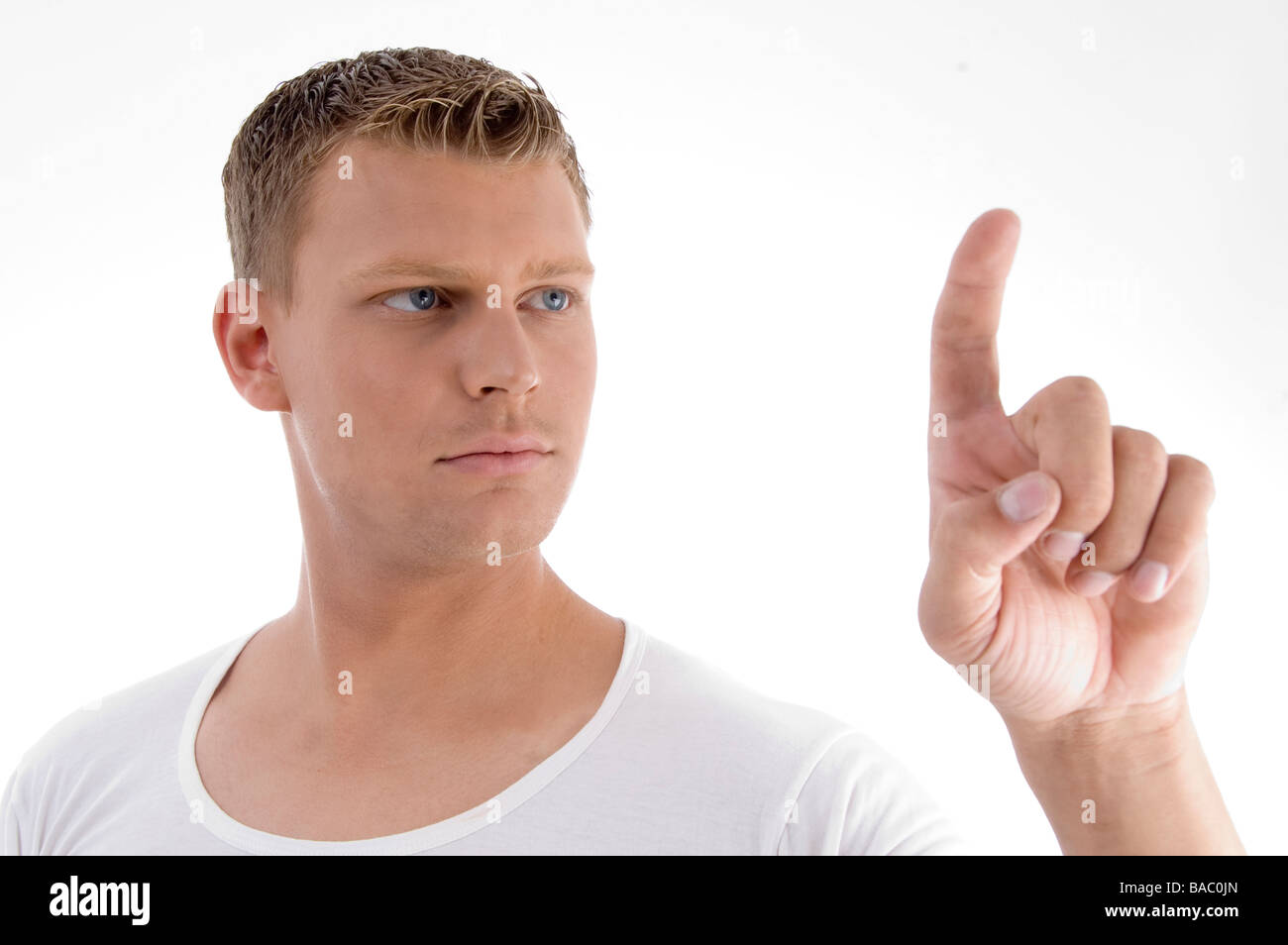 handsome young male pointing Stock Photo - Alamy