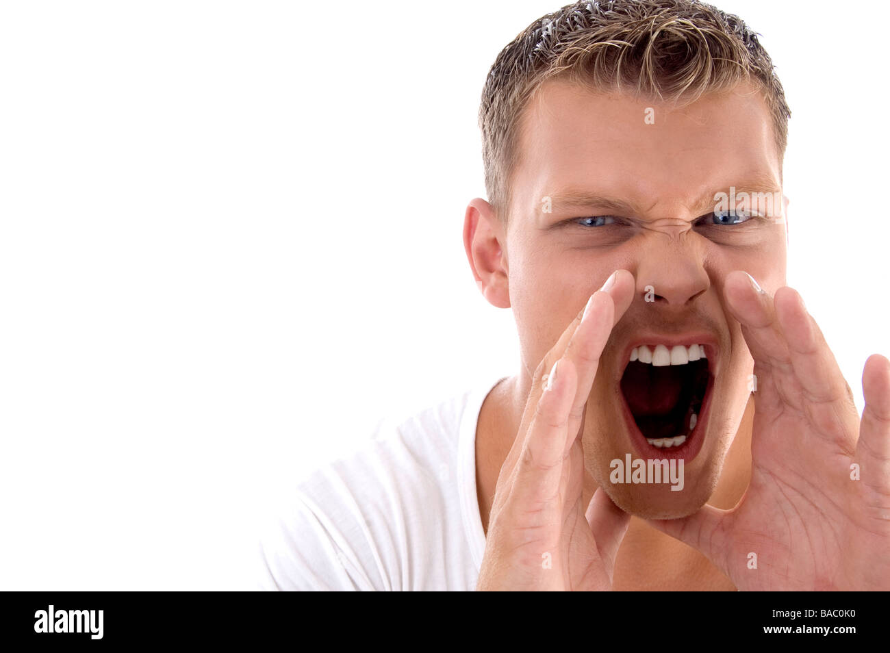 young fellow shouting loudly Stock Photo - Alamy