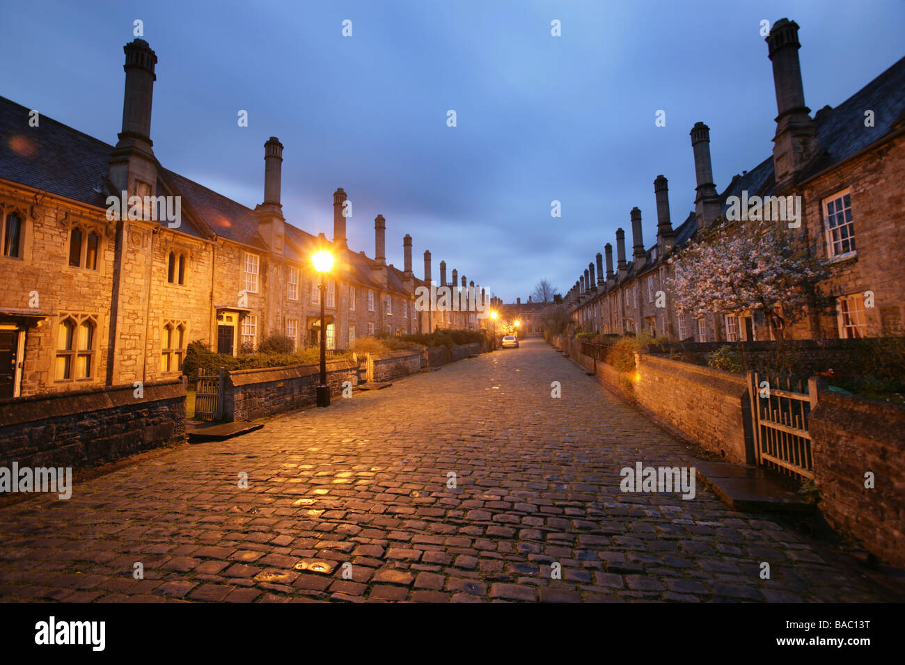 City of Wells, England. Night view of Vicars’ Close with the Vicars ...