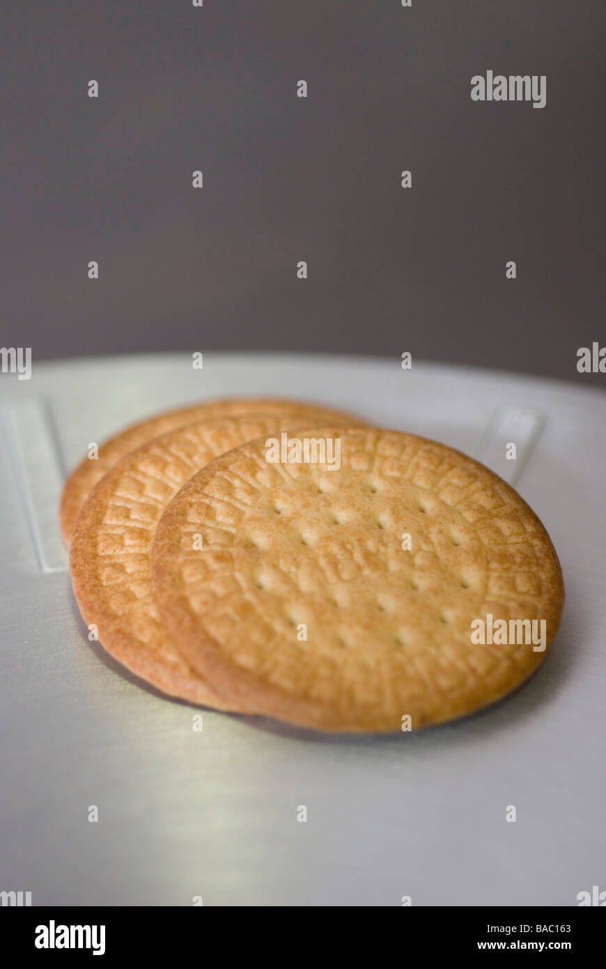 clock food control- biscuits Stock Photo - Alamy