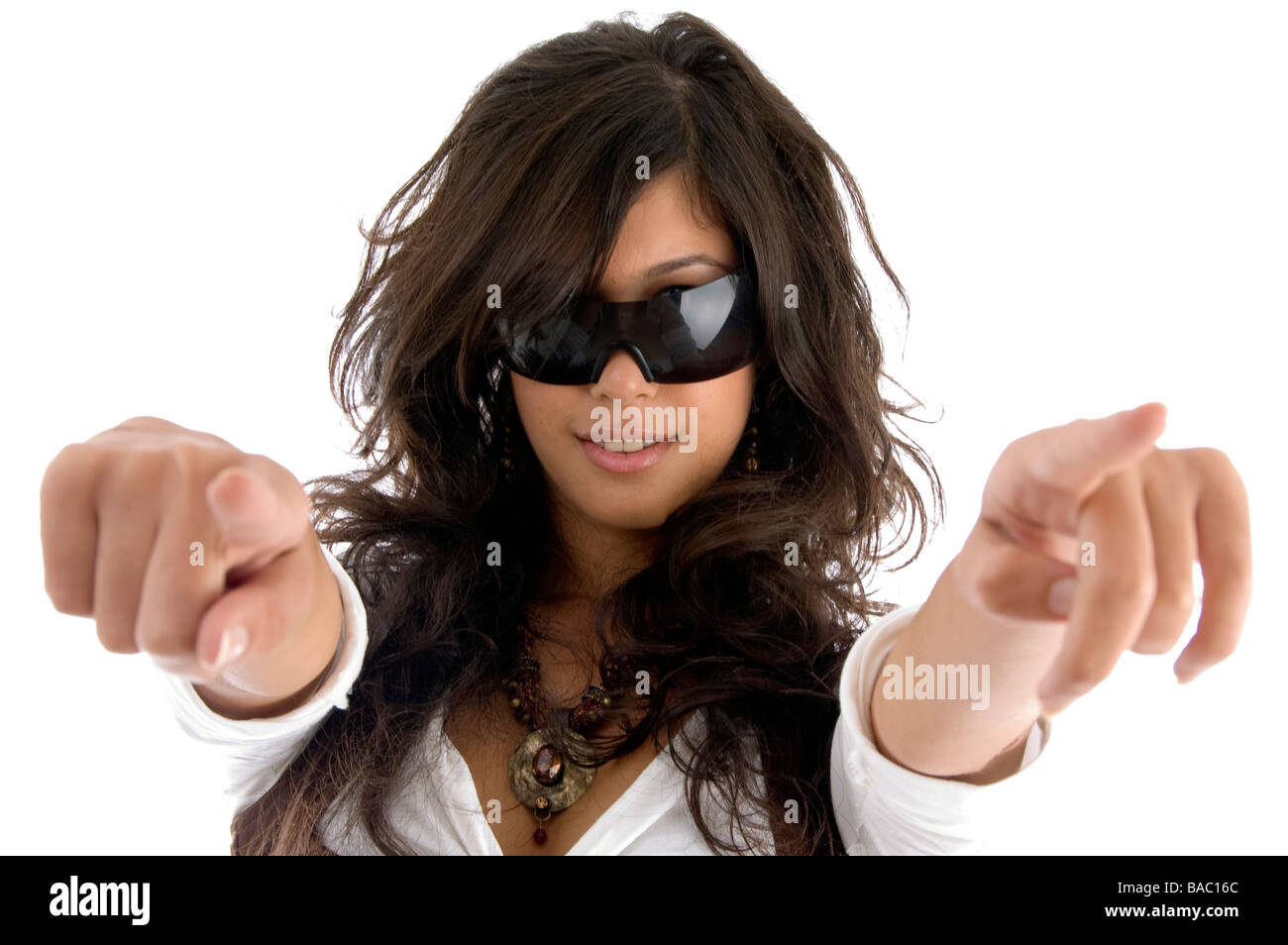 fashion model pointing with both hands Stock Photo - Alamy