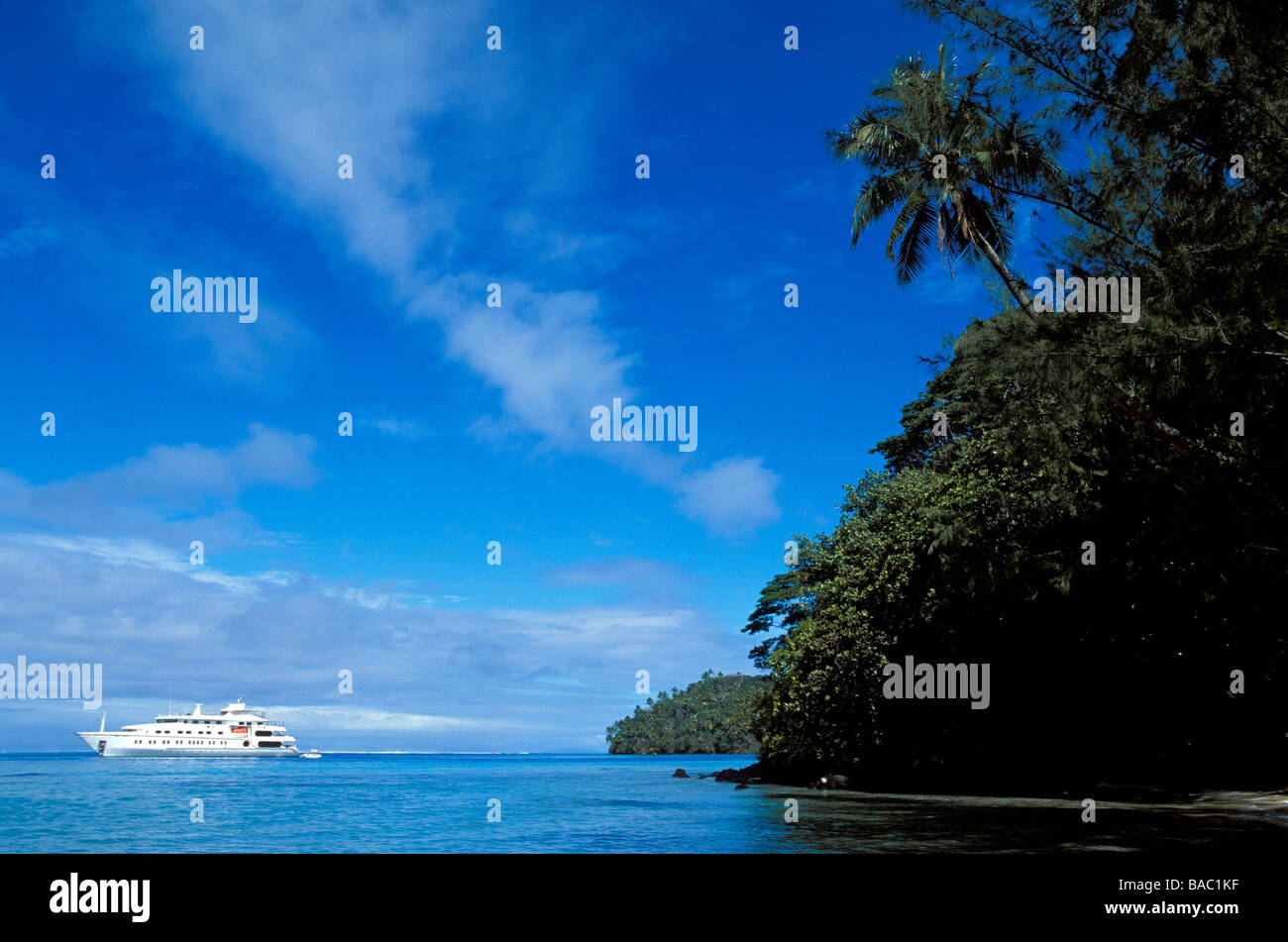 France, French Polynesia, Tia Moana Yacht sailing off of the island of ...
