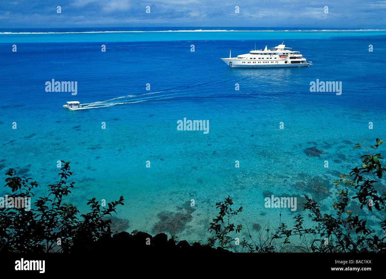 France, French Polynesia, Tia Moana Yacht sailing off of the island of ...