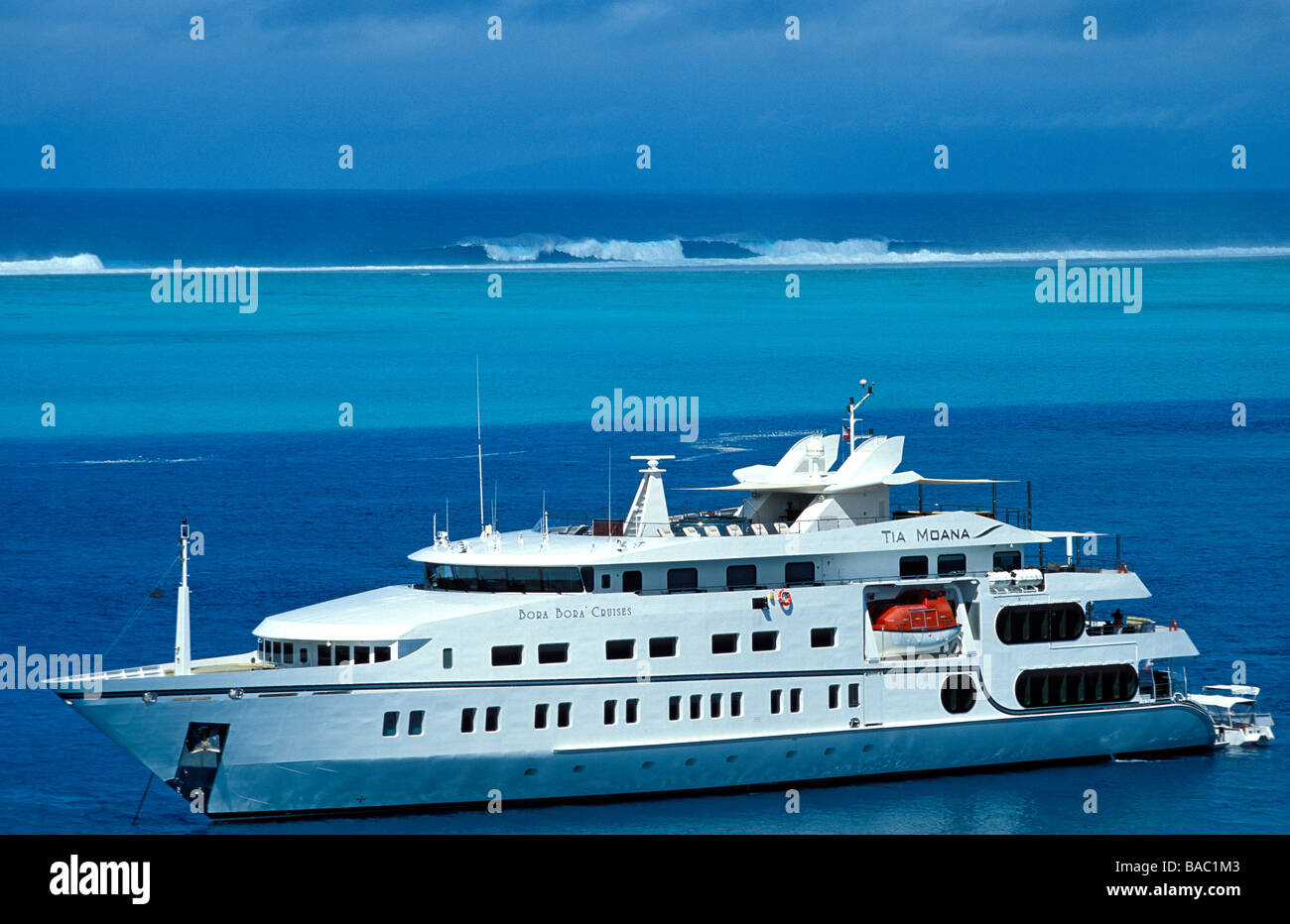 France, French Polynesia, Tia Moana Yacht sailing off of the island of ...