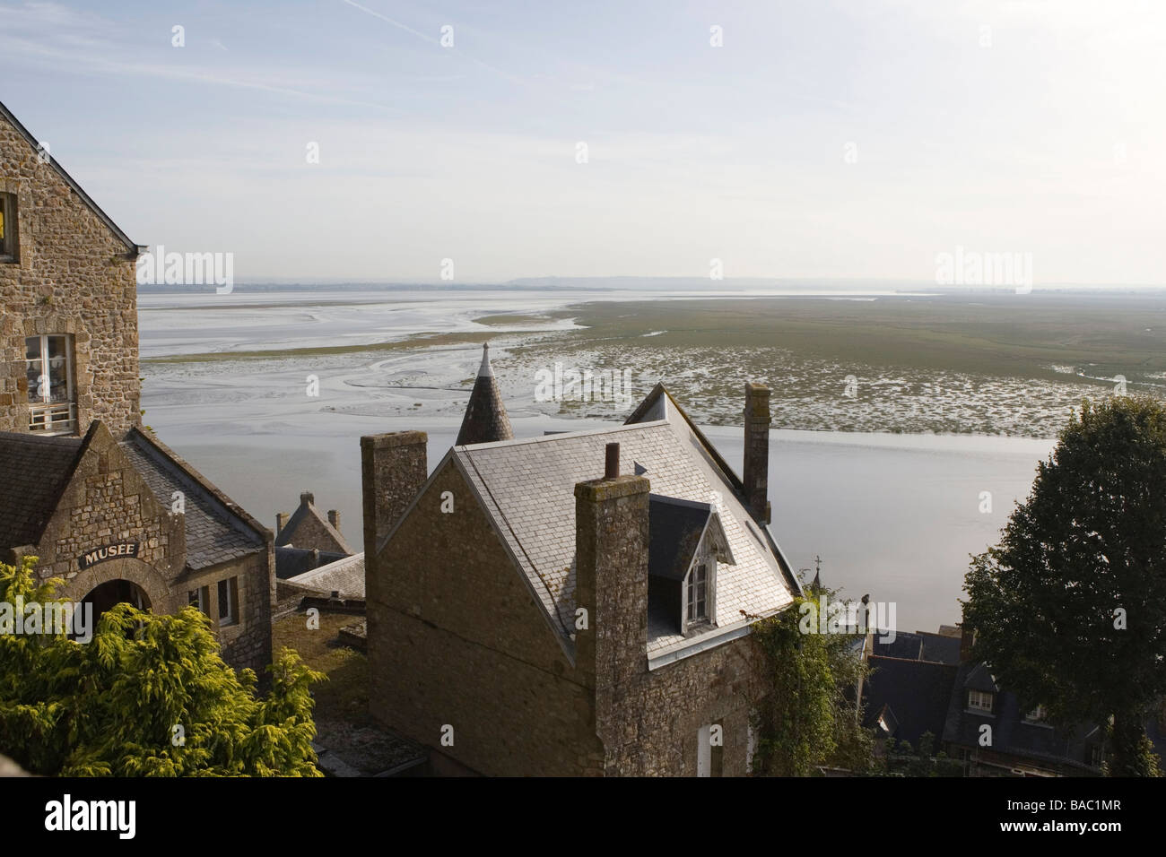 A view of the village and bay at low tide from Mont Saint Michel ...