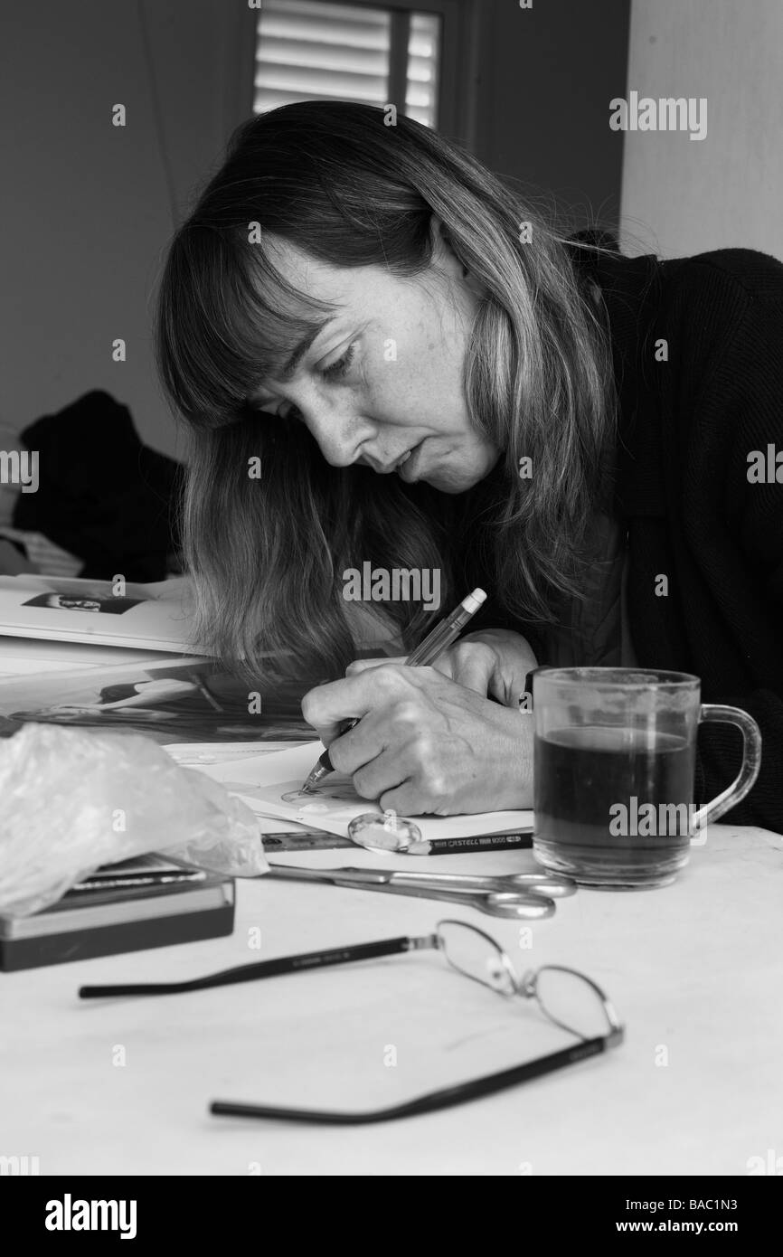 female Artist at work in her studio Stock Photo - Alamy