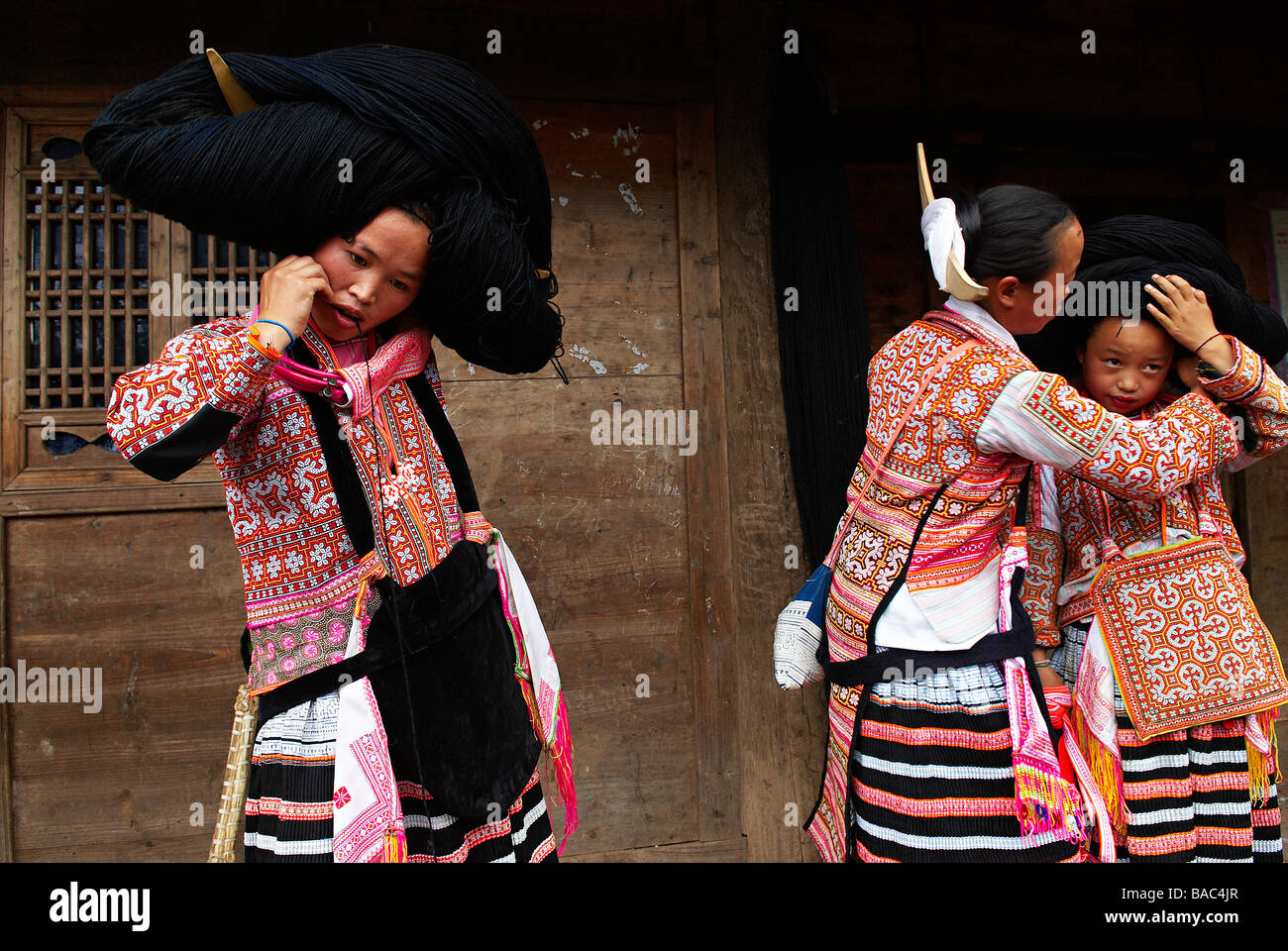 China, Guizhou Province, Longjia village, Long Horn Miao girls in ...