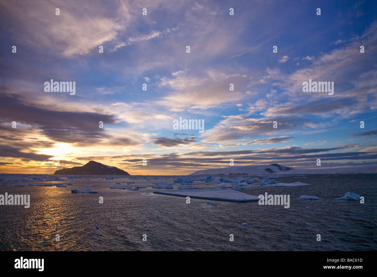 Sunset over sea ice around Paulet Island and the Antarctic Peninsula ...